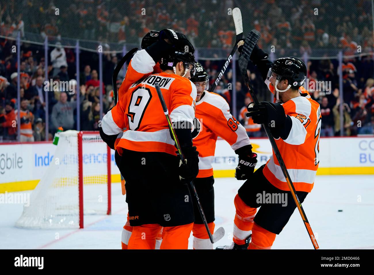 Philadelphia Flyers' Cam Atkinson (89) celebrates with teammates after ...