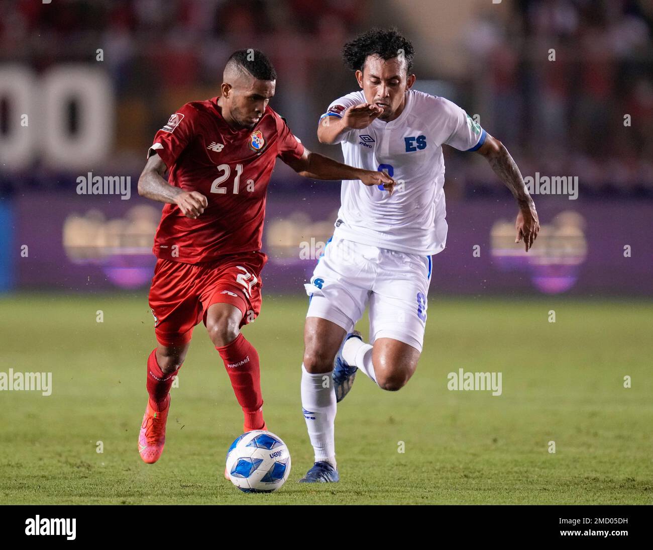 Panama's Cesar Yanis (21) and El Salvador's Bryan Landaverde vie for ...
