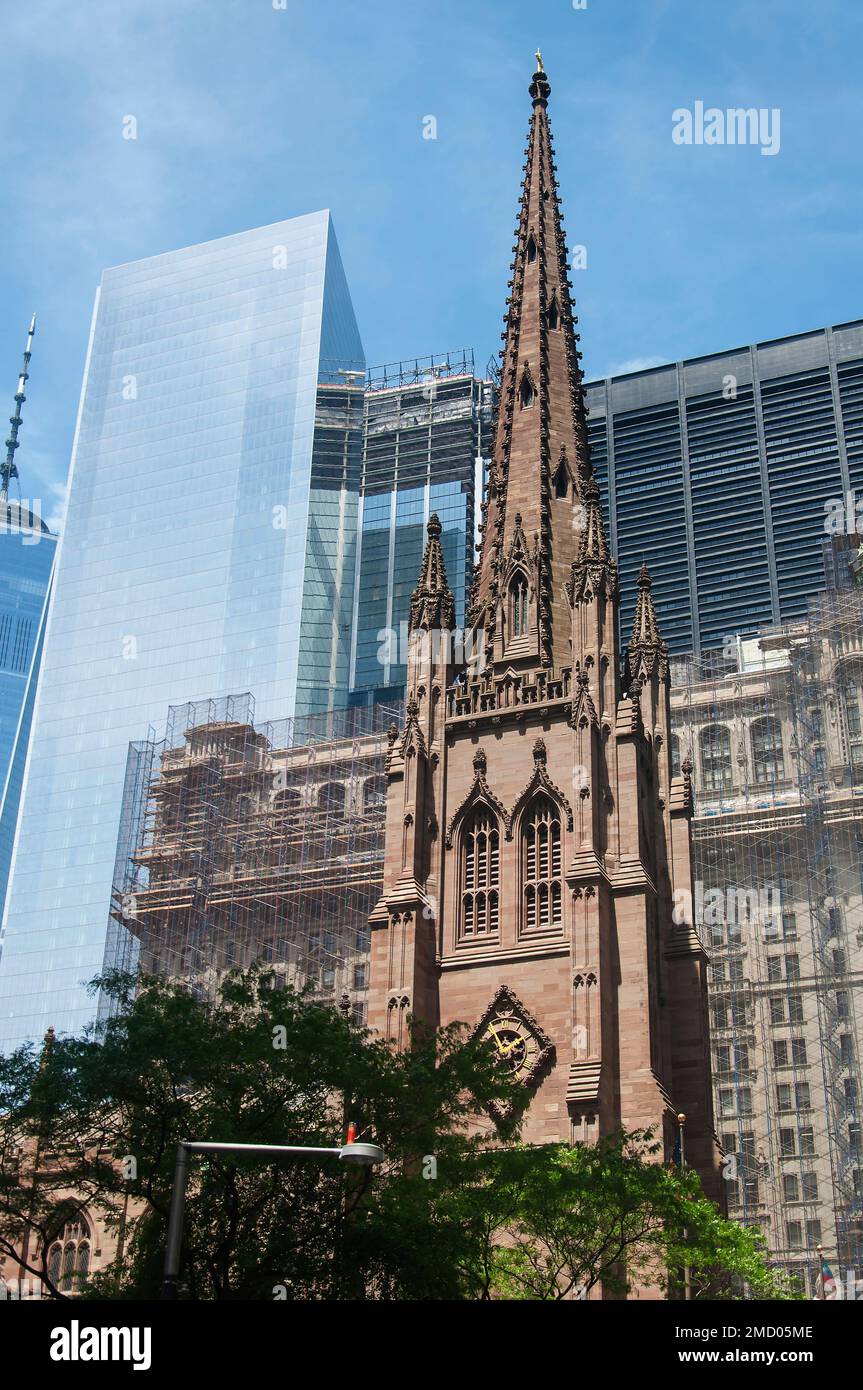 The landmark trinity church against a modern cityscape of buildings in ...