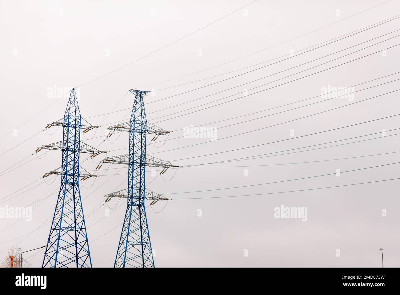 Blue high Pylon high-voltage power lines, high voltage electric ...
