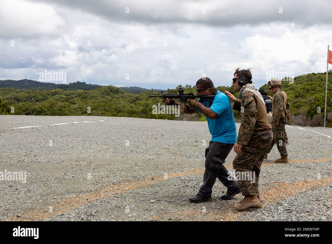 U.S. Marine Corps Cpl. Elston Hoyt, a range coach with Task Force Koa ...
