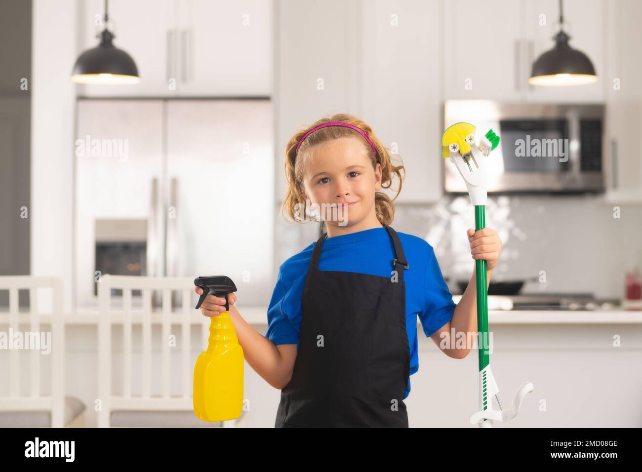 Boy mopping sweeping floor hi-res stock photography and images - Alamy