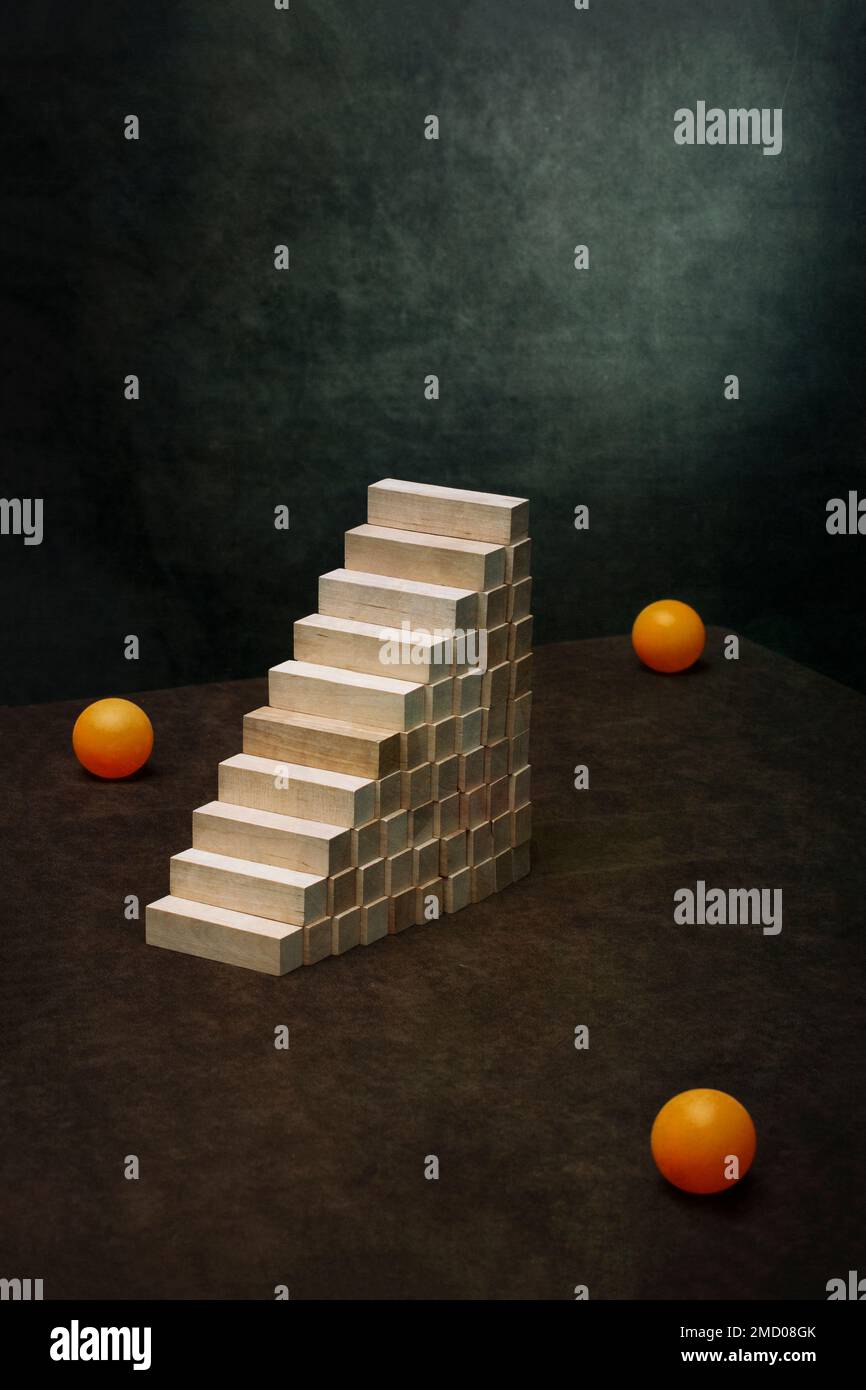 Still life with a pyramid figure and balls Stock Photo - Alamy