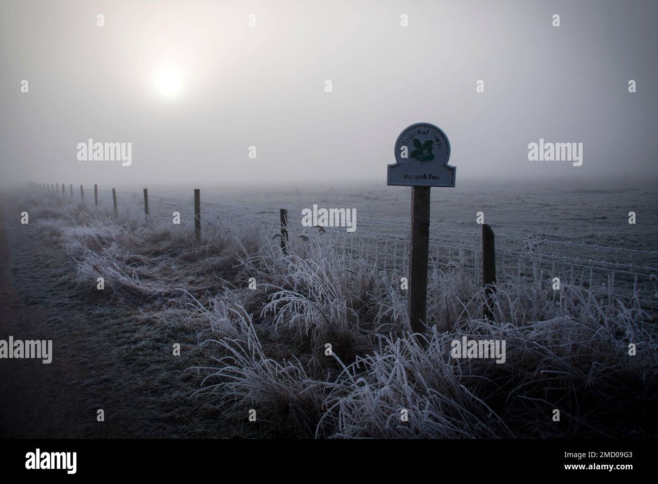 The National trust sign at Wicken Fen on a very cold January morning ...