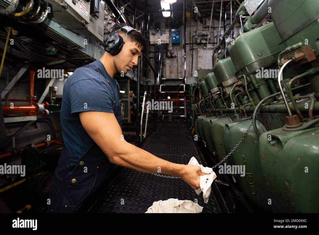 U.S. Coast Guard Petty Officer 3rd Class Napana Keoho, a machinery ...