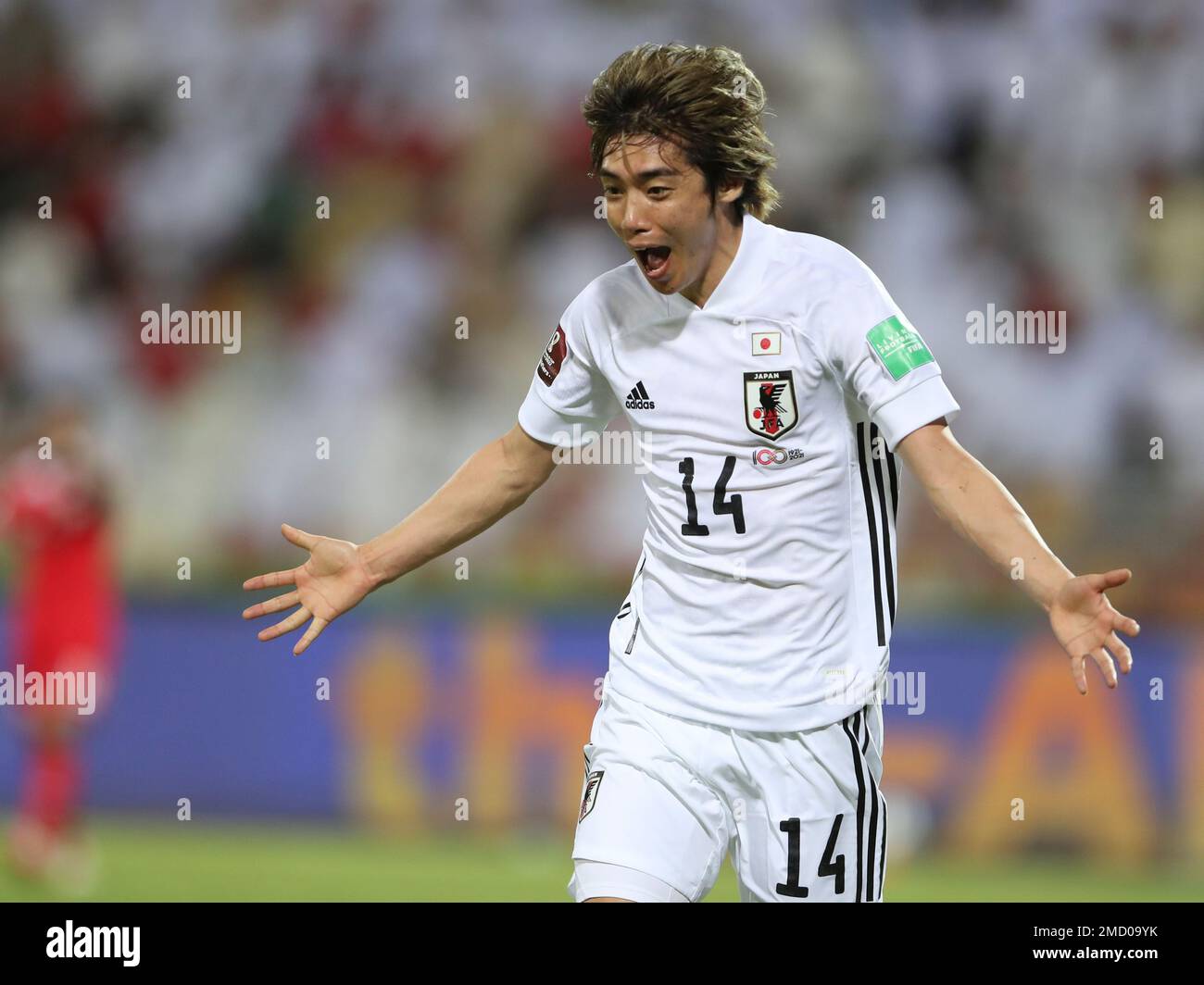 Japan's Junya Ito celebrates after a goal during a a qualifying soccer ...