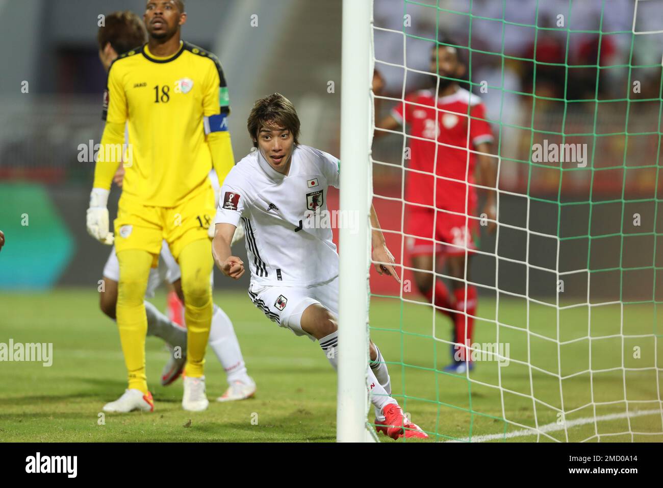 Japan's Junya Ito celebrates after a goal during a a qualifying soccer ...