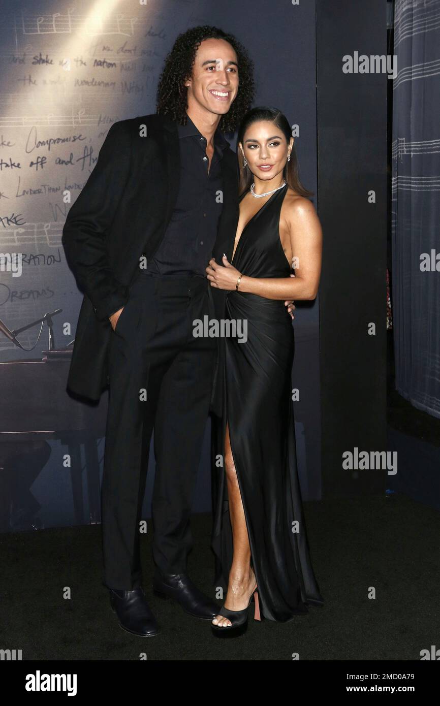 Cole Tucker, left, and Vanessa Hudgens attend the premiere of "tick ...