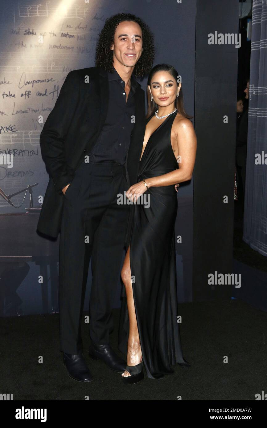 Cole Tucker, left, and Vanessa Hudgens attend the premiere of "tick ...