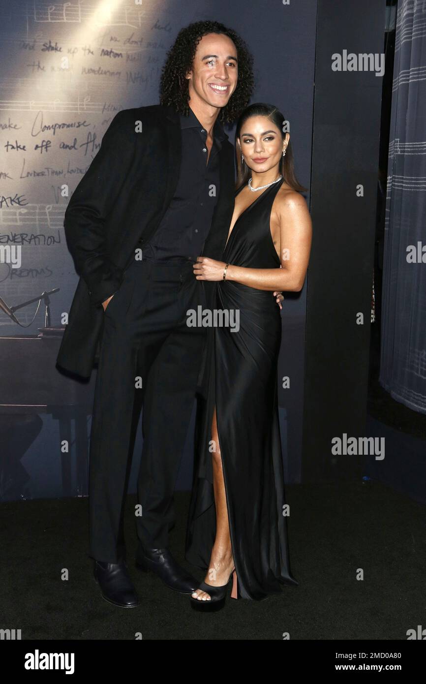 Cole Tucker, left, and Vanessa Hudgens attend the premiere of "tick ...