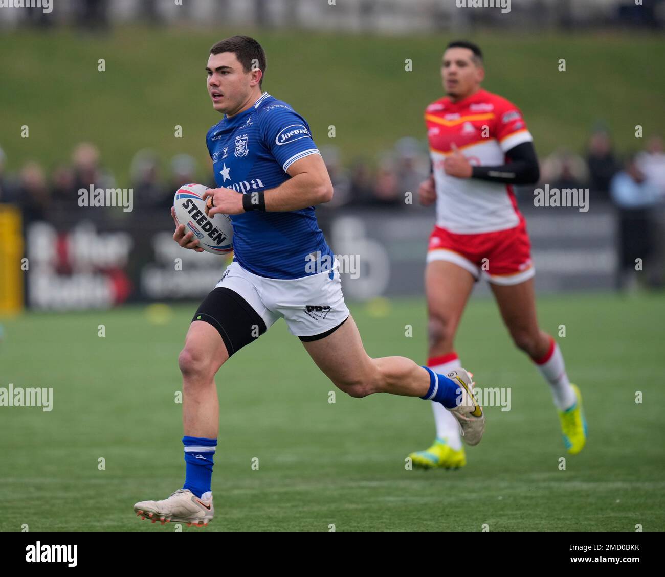 Jake Clifford #7 of Hull FC breaks away to score his sides second try ...