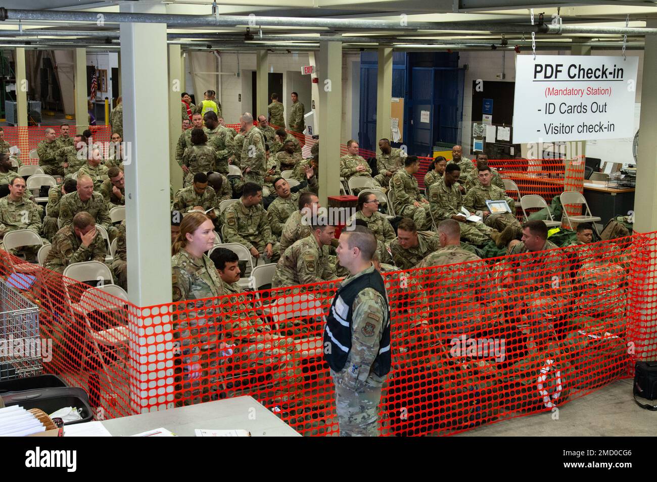 Team Dover members wait in the personnel deployment function line check-in area during Liberty ...
