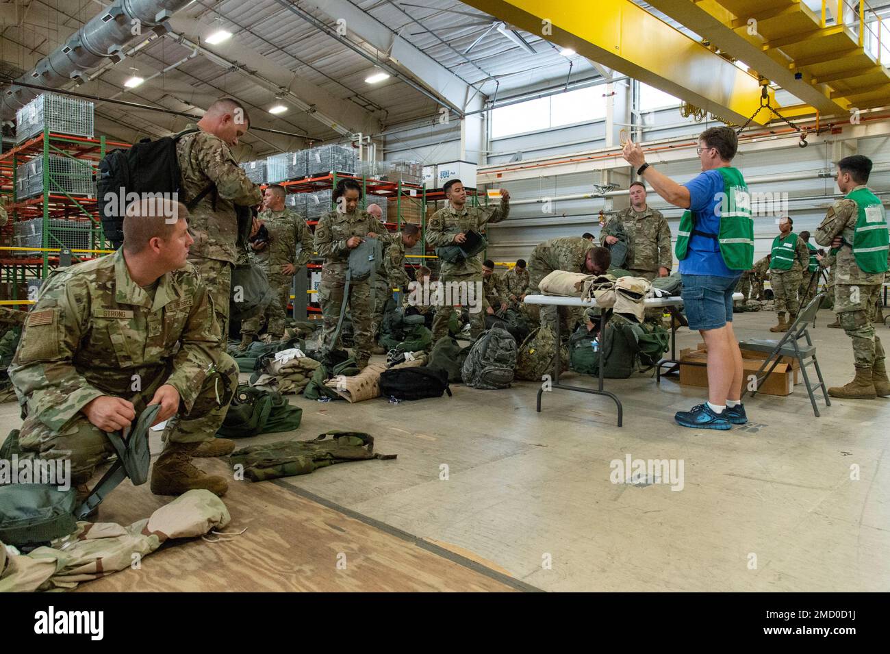 Team Dover members inventory their equipment as they process through ...
