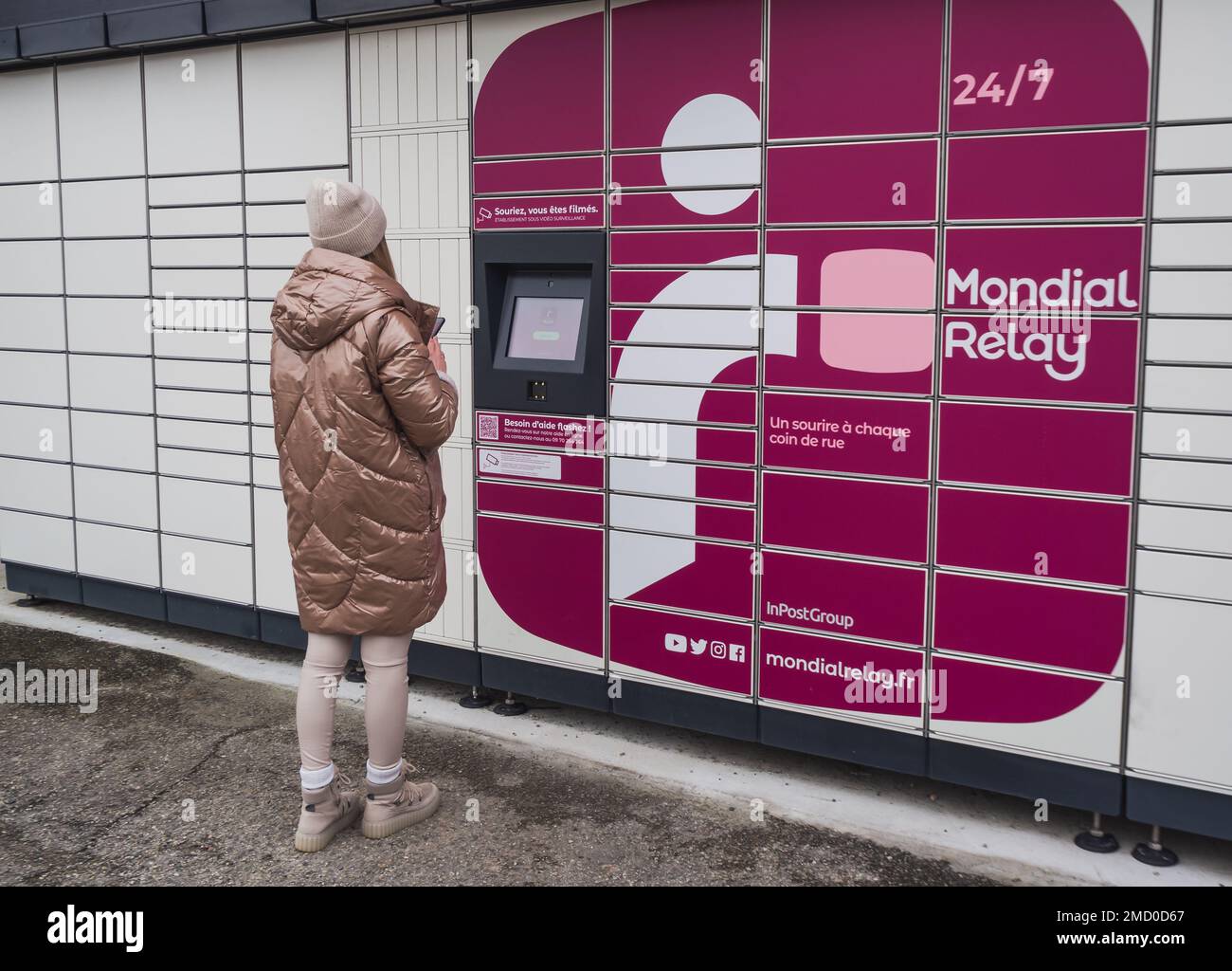 Loriol sur Drome, France - January 14, 2023: Picking up a parcel from a ...