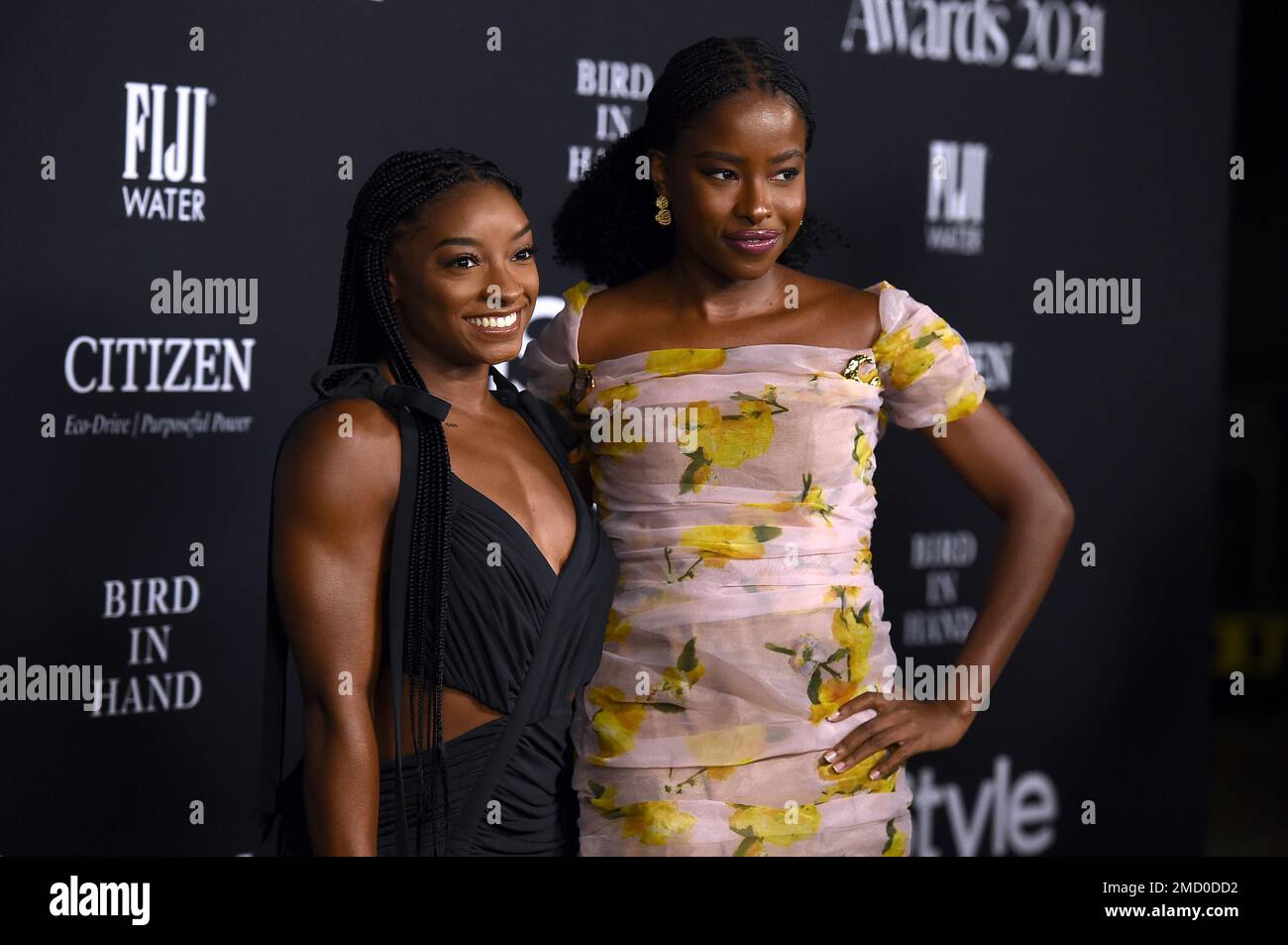 Simone Biles, left, and Amanda Gorman arrive at the InStyle Awards at ...