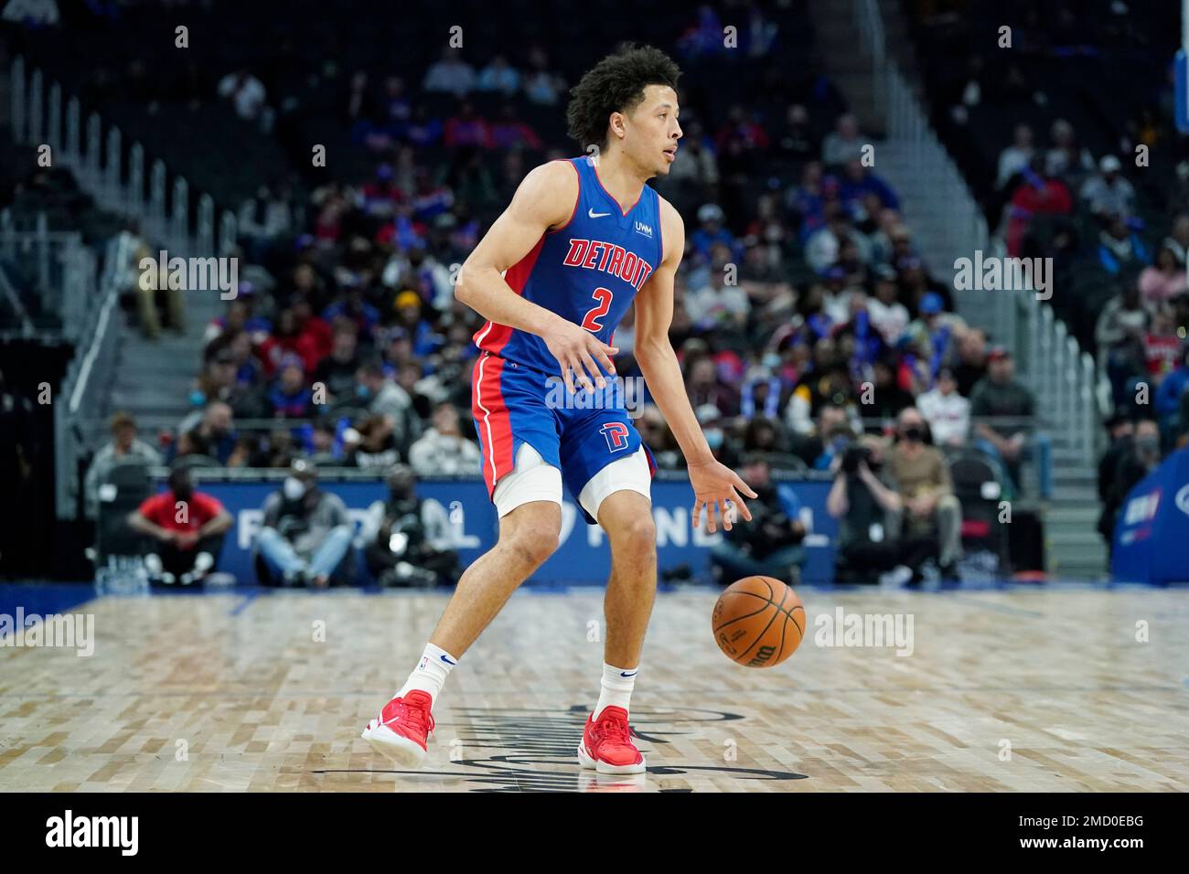 Detroit Pistons guard Cade Cunningham brings the ball up court during ...