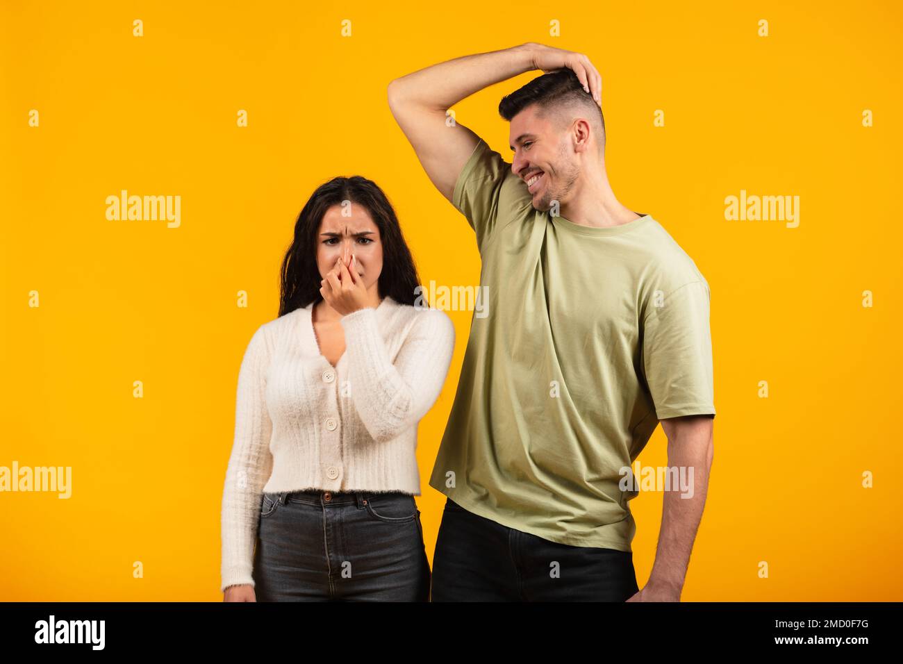 Sad displeased millennial arabic female covers her nose from smell of ...