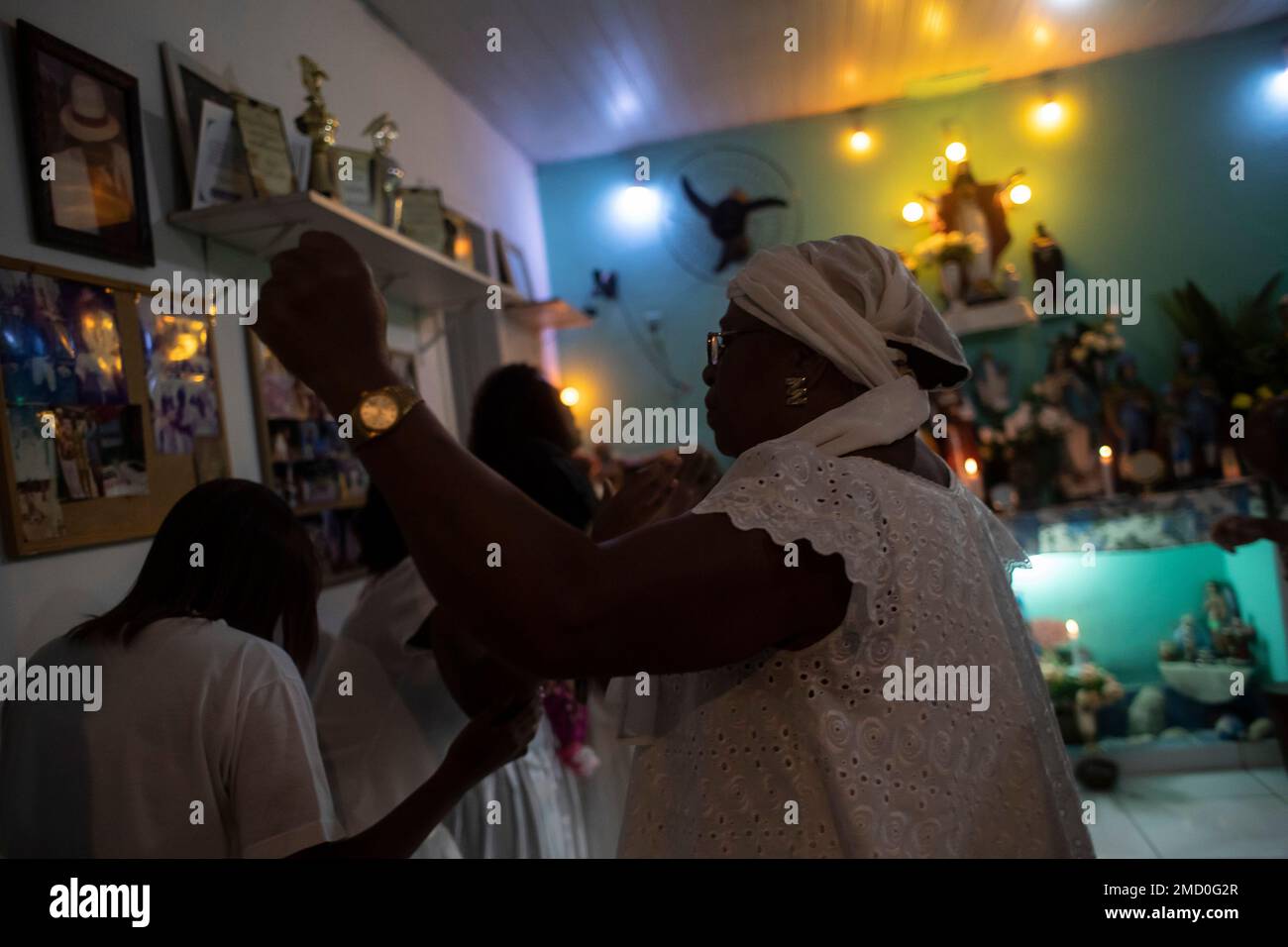 Devotees participate in a ceremony of Umbanda religious ceremony at the ...