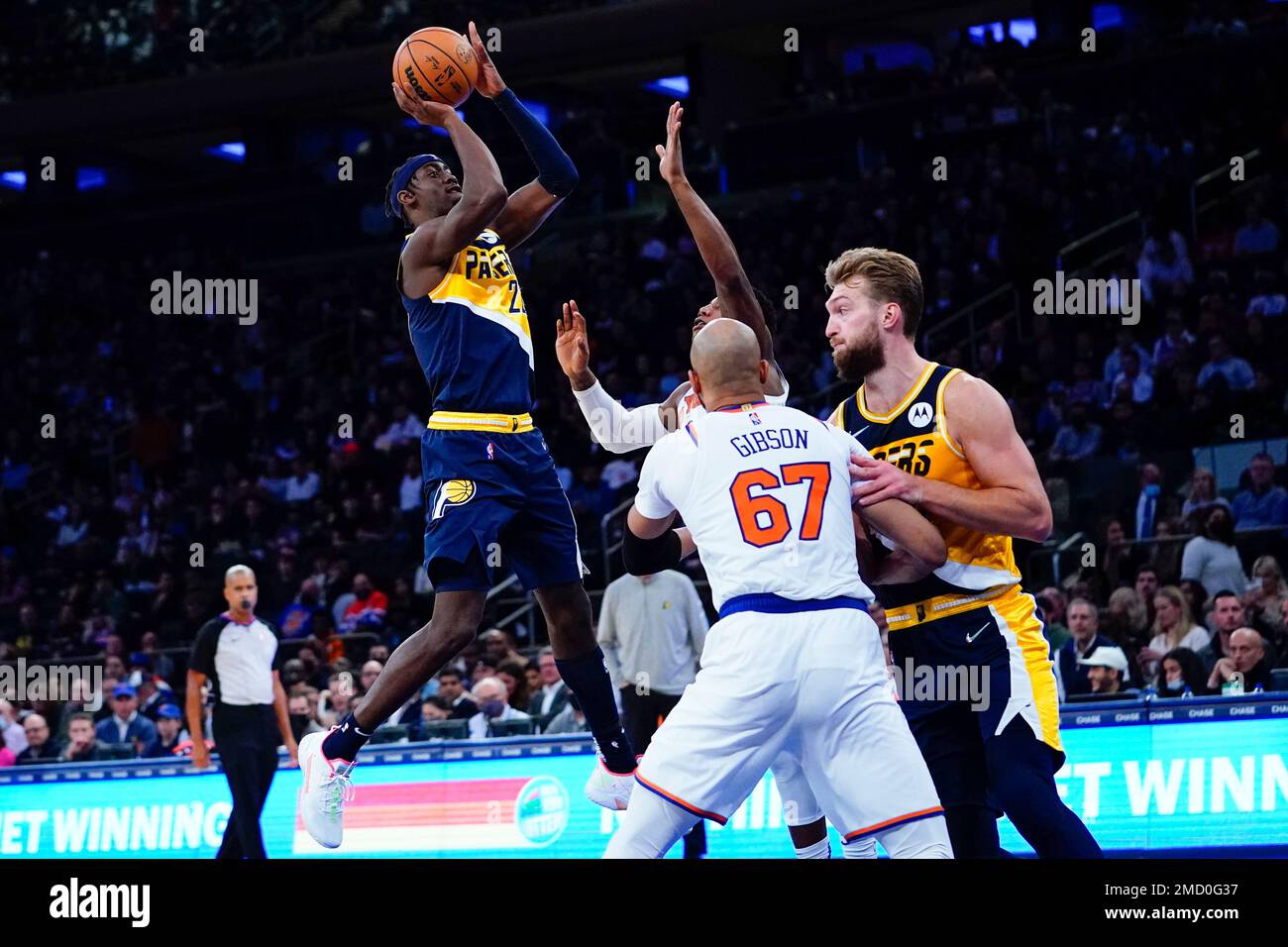 Indiana Pacers' Caris LeVert (22) shoots over New York Knicks' Taj ...