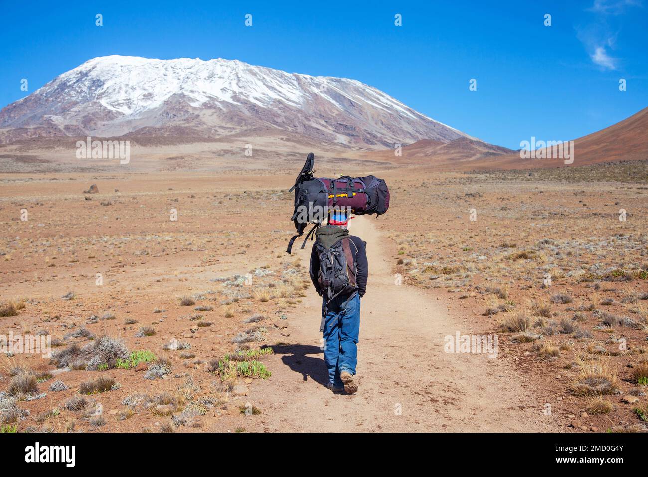 Porter carrying heavy load hi-res stock photography and images - Alamy
