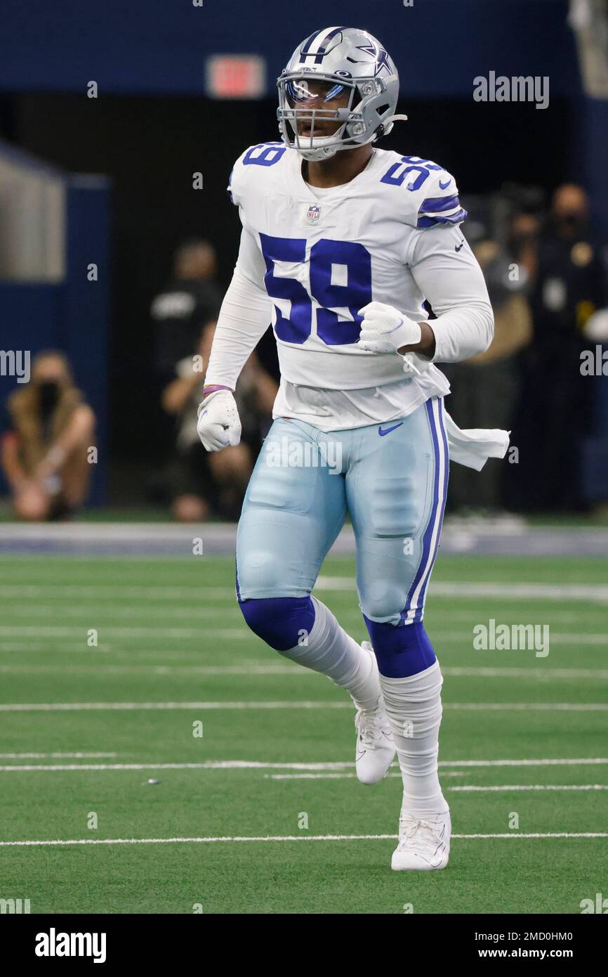 Dallas Cowboys defensive end Chauncey Golston (59) runs off the field ...