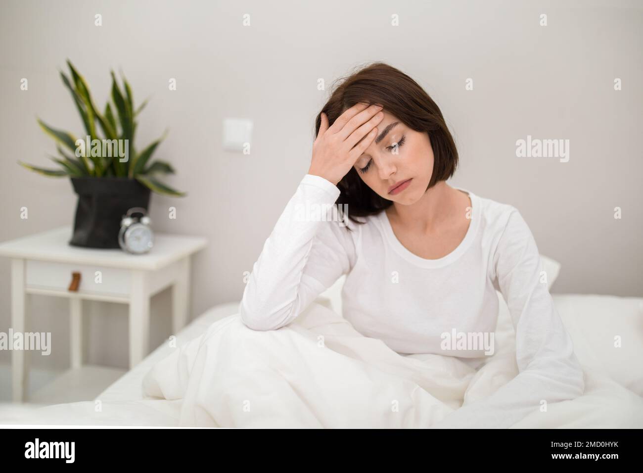Tired young woman in medical hi-res stock photography and images - Alamy