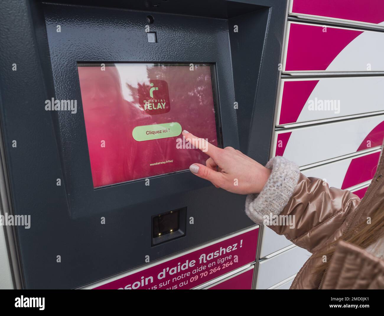 Loriol sur Drome, France - January 14, 2023: Picking up a parcel from a ...