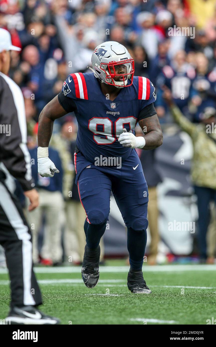 New England Patriots defensive tackle Christian Barmore (90) defends ...