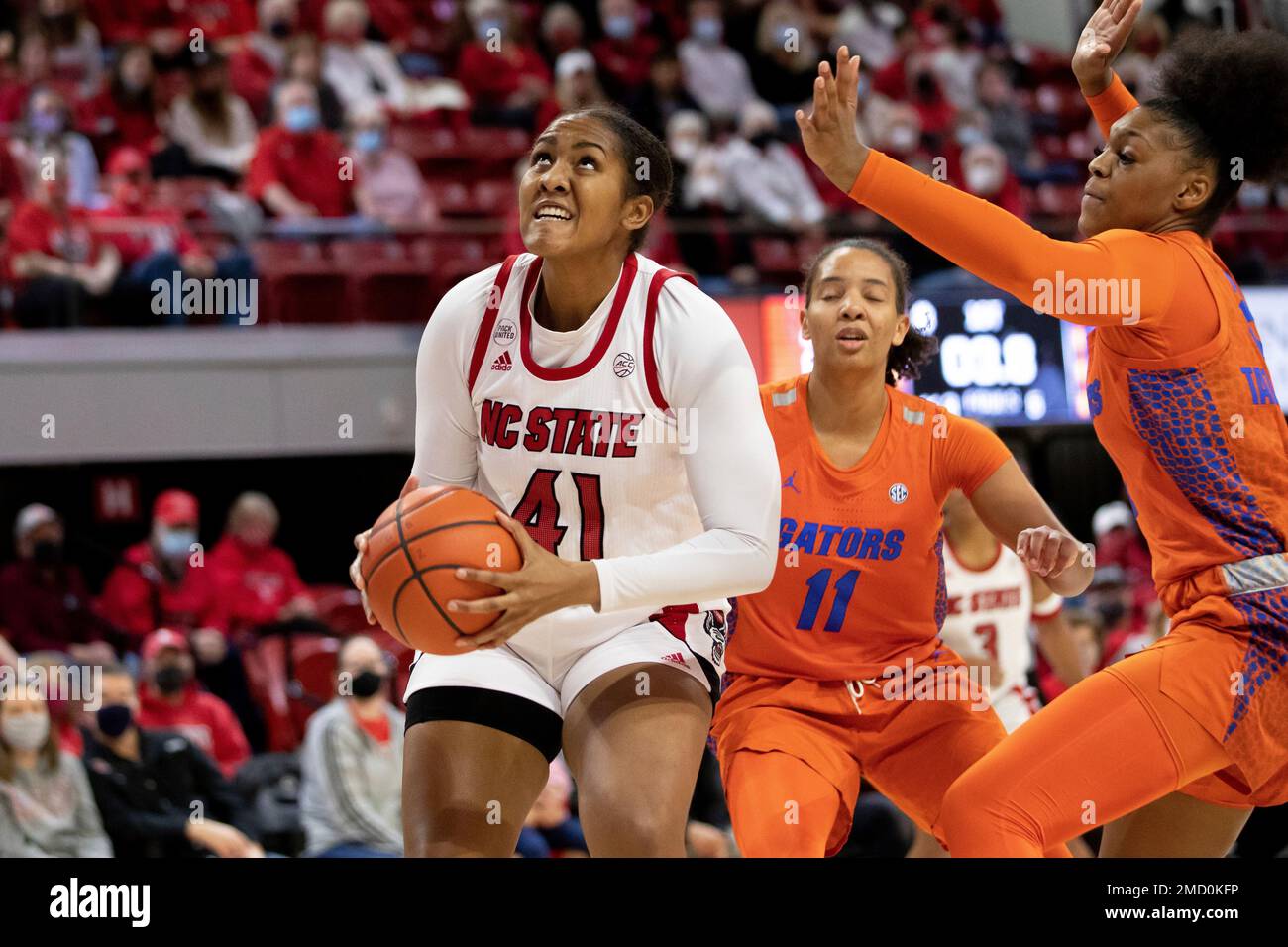 North Carolina State's Camille Hobby (41) handles the ball against ...