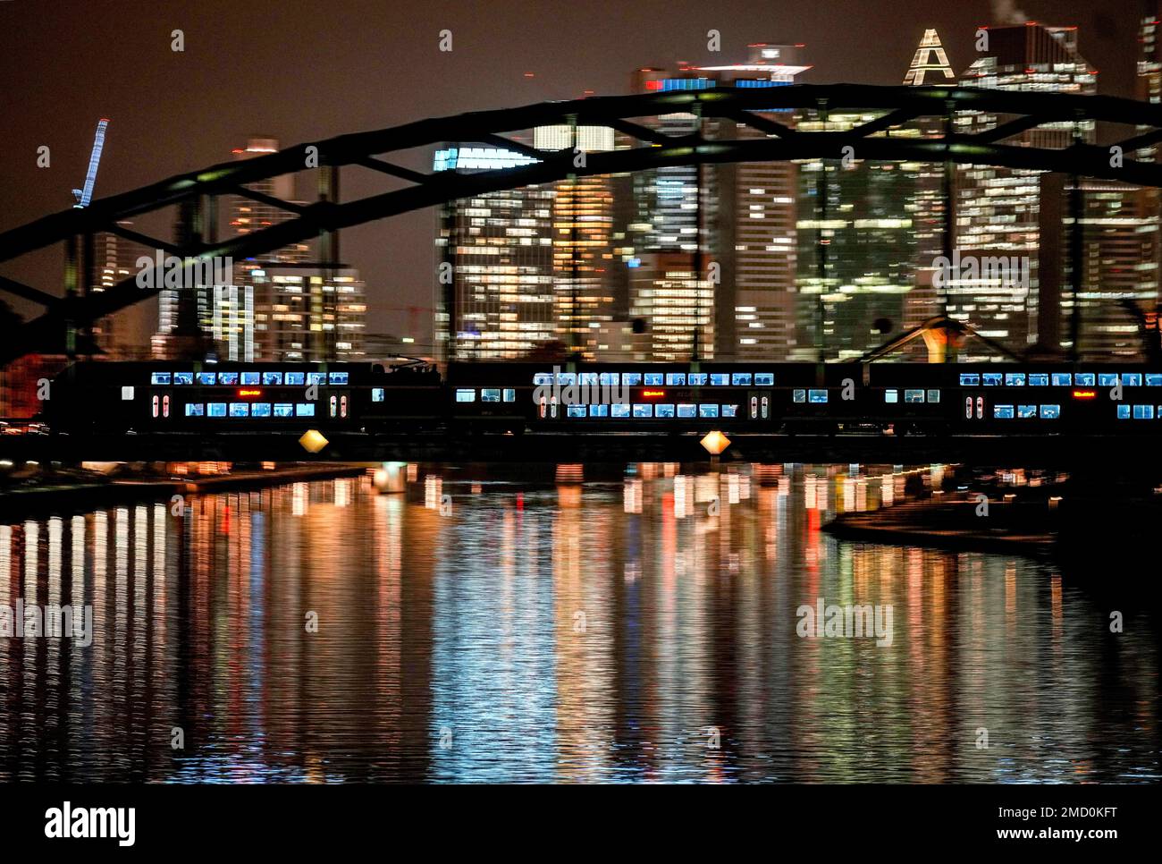 A regional commuter train passes the buildings of the banking district ...
