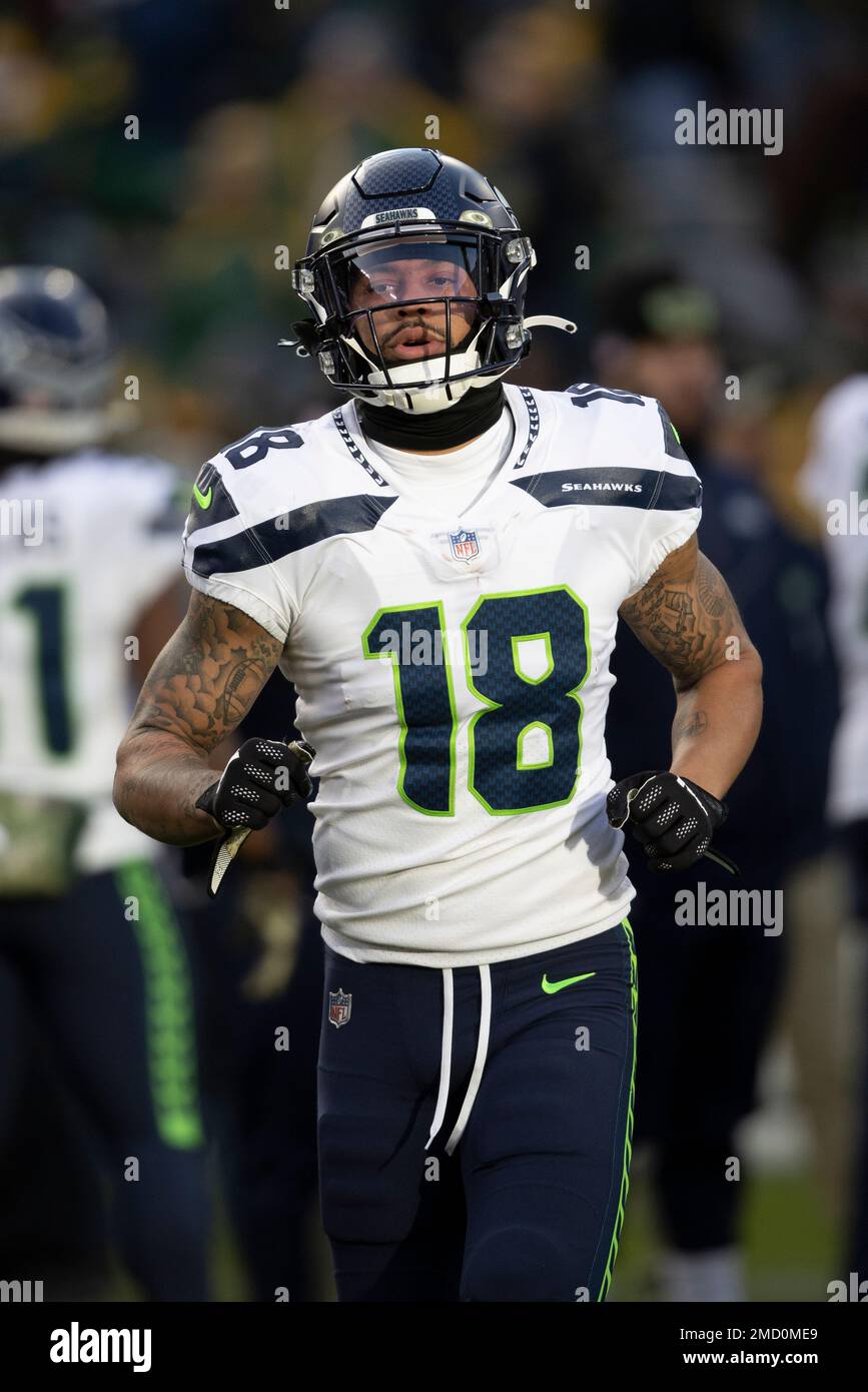 Seattle Seahawks wide receiver Freddie Swain (18) runs before during an ...