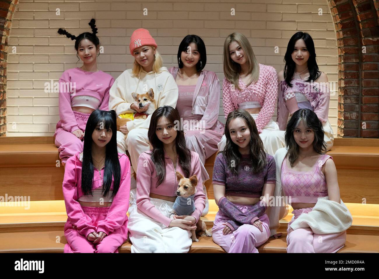 South Korean K-pop group TWICE poses for a photo after an interview in ...