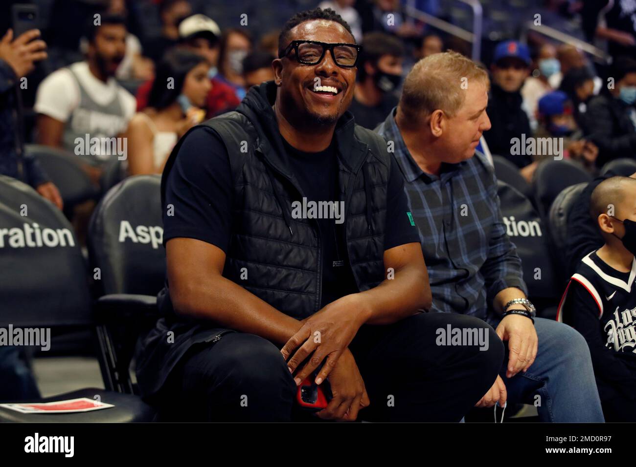 Former NBA basketball player Paul Pierce, left, smiles from the front ...
