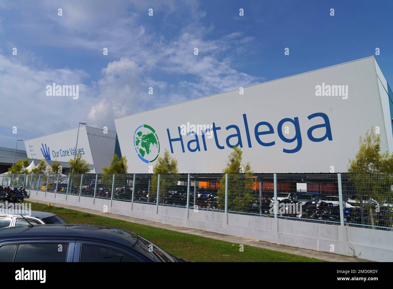 Hartalega Holdings logo is displayed on a sign outside its headquarters ...