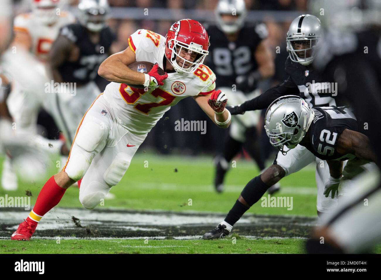 Kansas City Chiefs tight end Travis Kelce (87) is tackled by Las Vegas ...