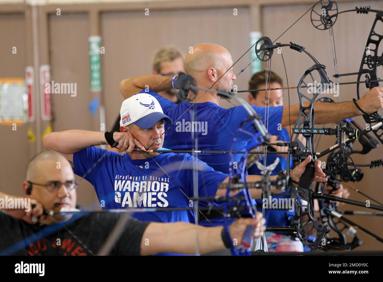Retired U.S. Air Force TSgt. Eric Heideman practices his archery skills ...