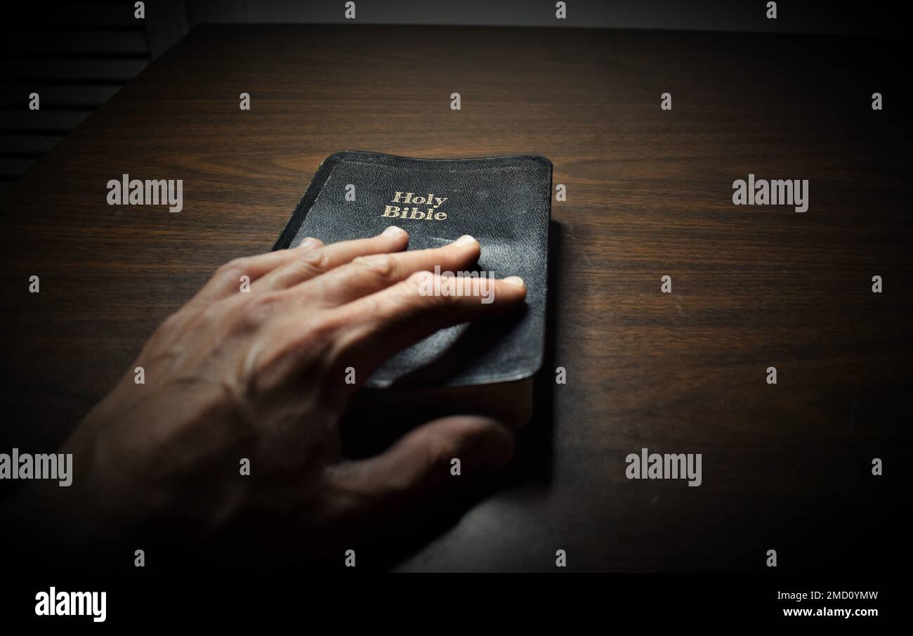 Reaching for God's Word 1 Stock Photo - Alamy
