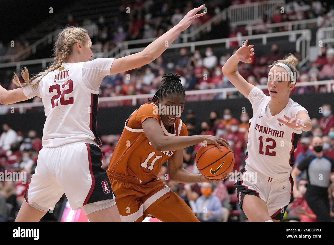 Texas guard Joanne Allen-Taylor (11) drives to the basket past Stanford ...
