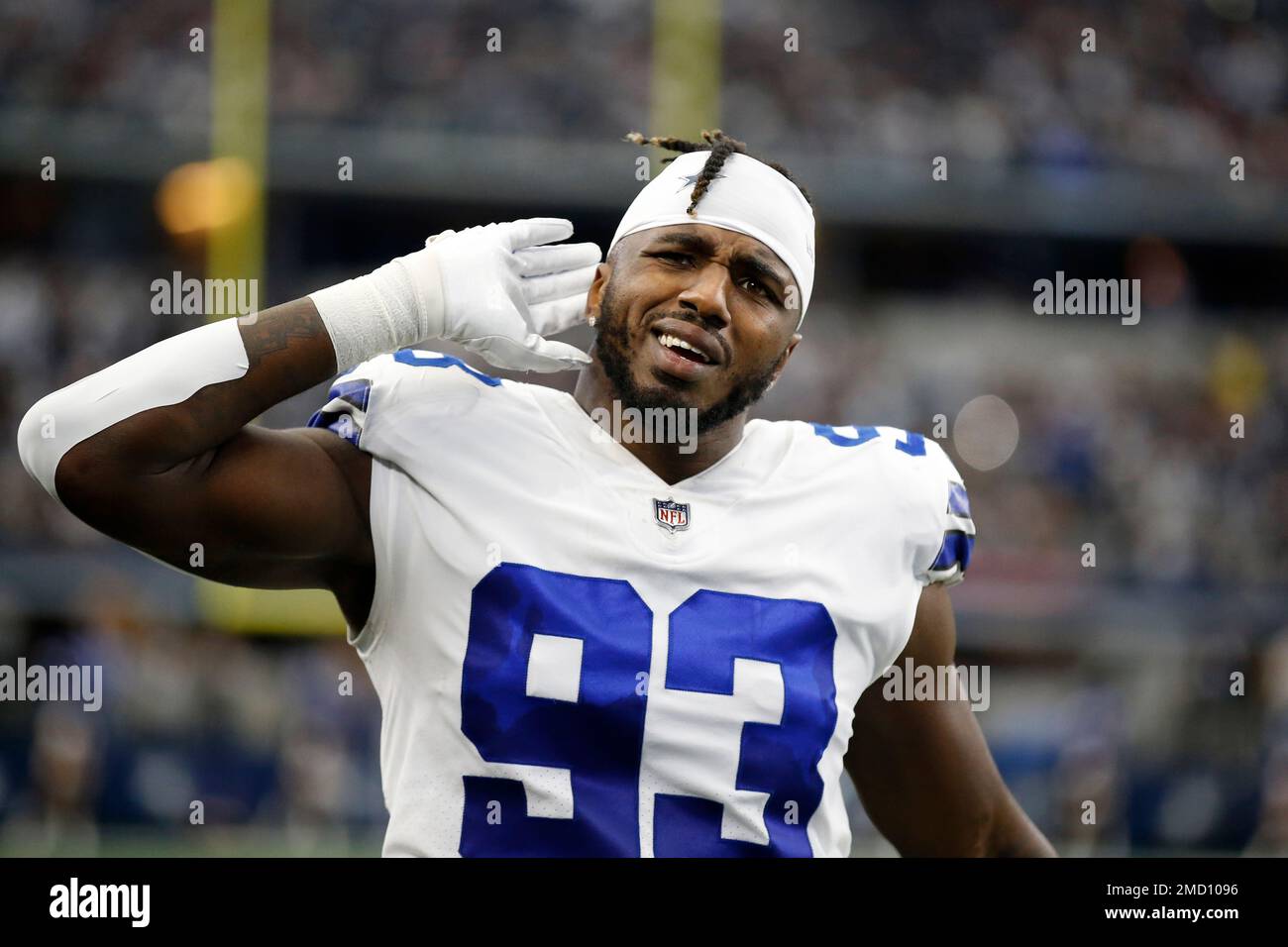 Dallas Cowboys defensive end Tarell Basham gestures to the crowd before ...