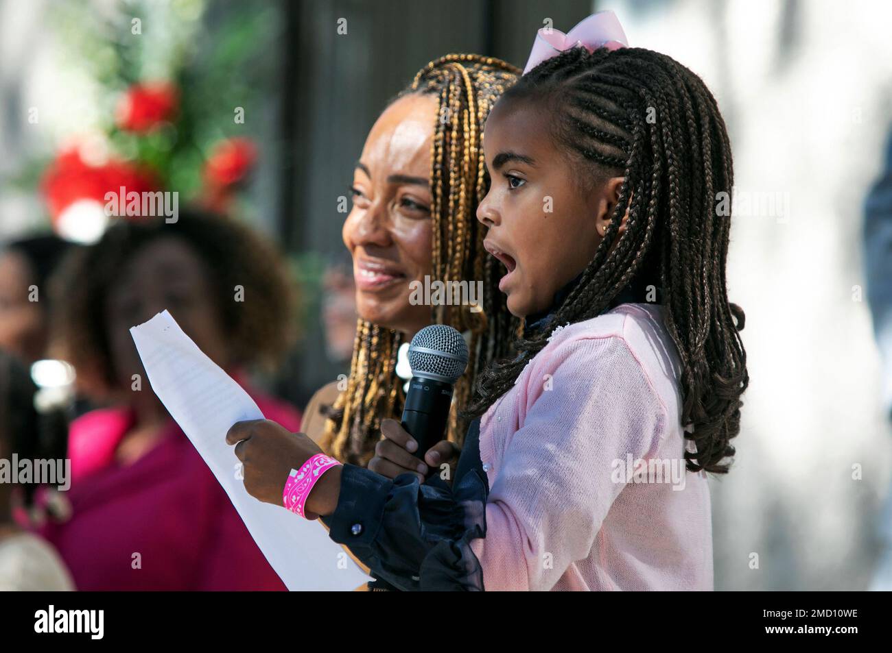 Seven-year-old Elan Jolie Hebert reads a speech praising the "New ...