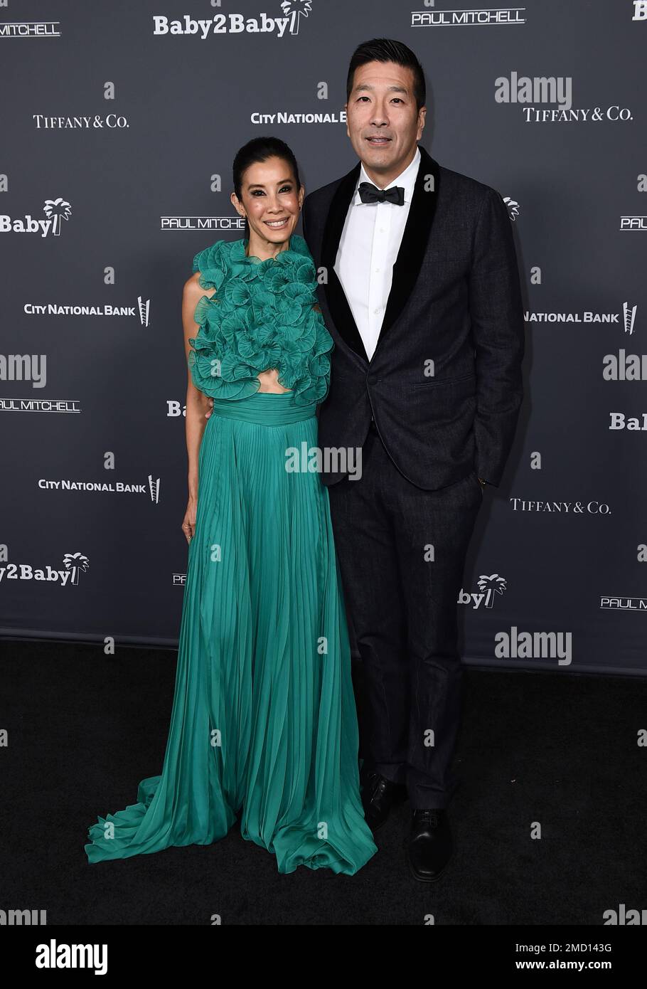 Lisa Ling, left, and Paul Song arrive at the Baby2Baby Gala at the ...