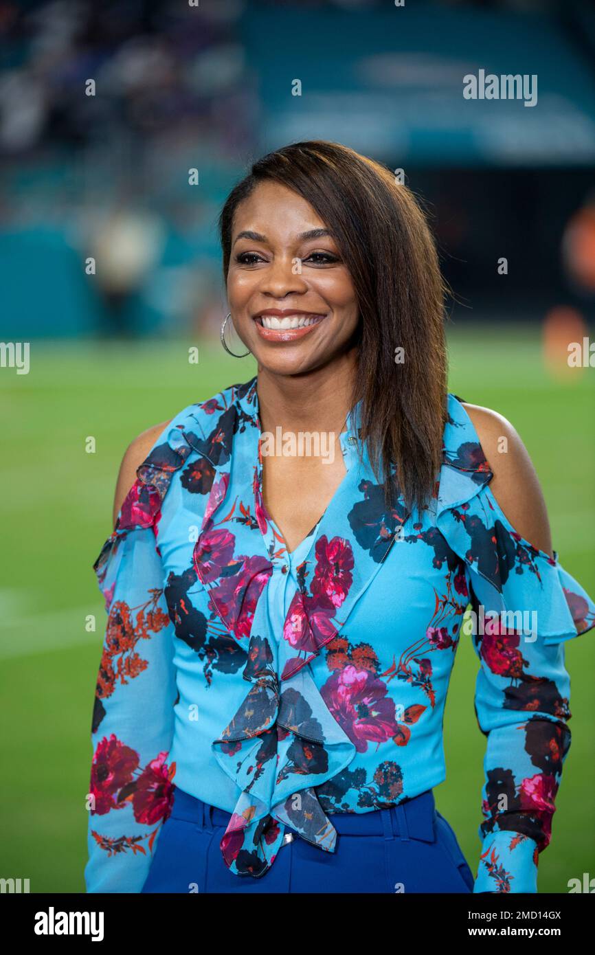 NFL Network sideline reporter Kristina Pink prepares to speak on air ...