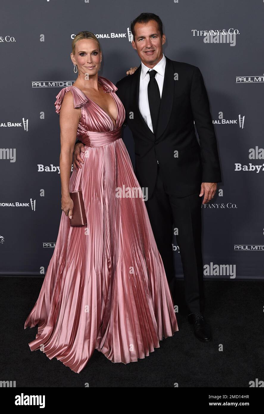 Molly Sims, left, and Scott Stuber arrive at the Baby2Baby Gala at the ...