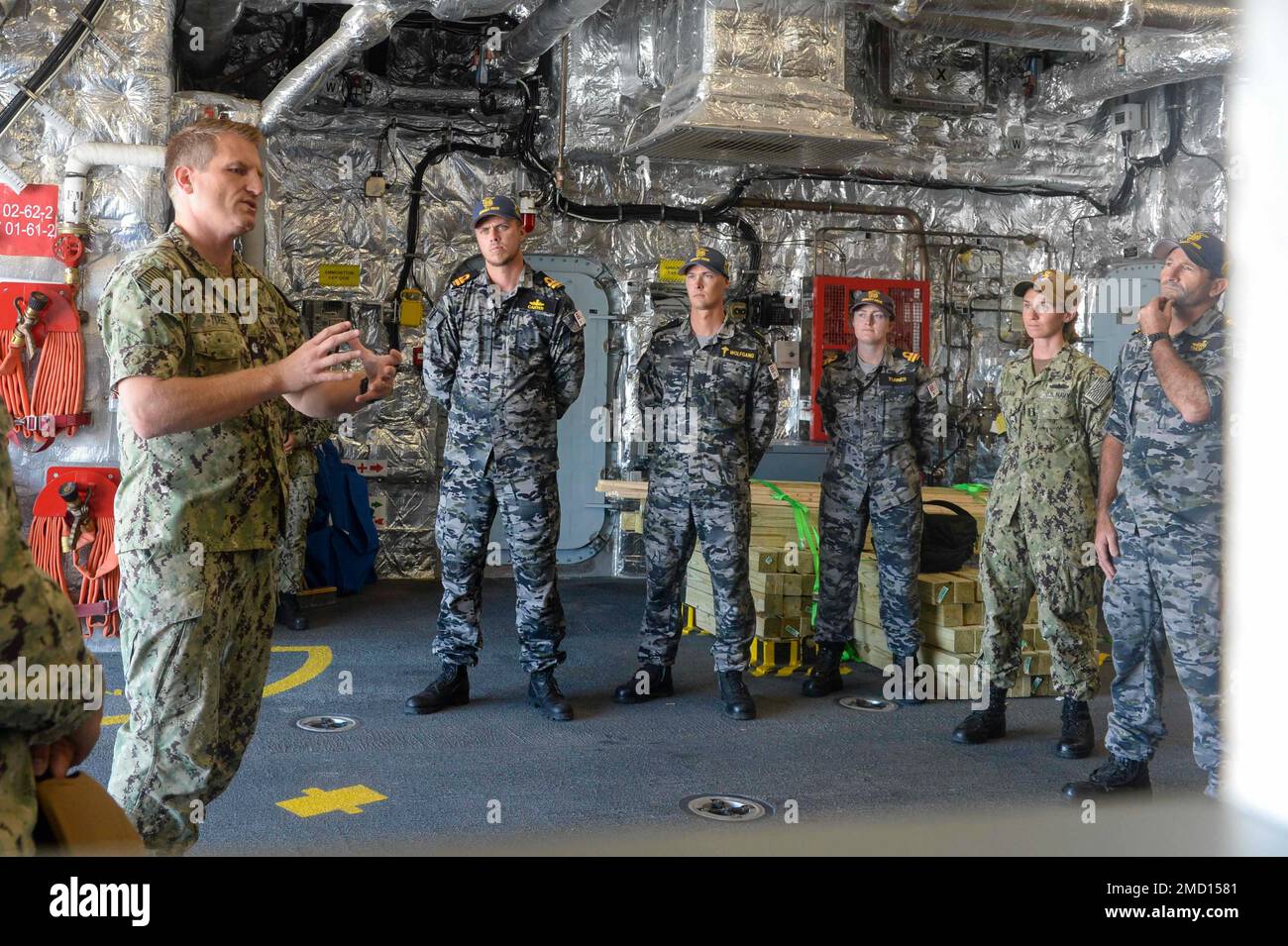 220712-N-ZS023-1081 SAN DIEGO (July 12, 2022) Cmdr. Michael Tyree, left ...