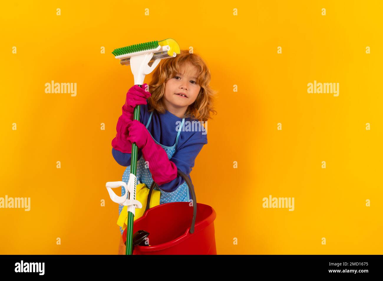 Little kid cleaning at home. Child doing housework having fun. Studio ...