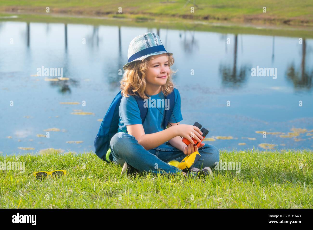 Travel and adventure concept. Little child boy tourist explorer with ...