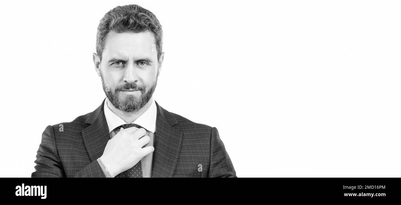Portrait of professional man businessman with serious face adjusting ...