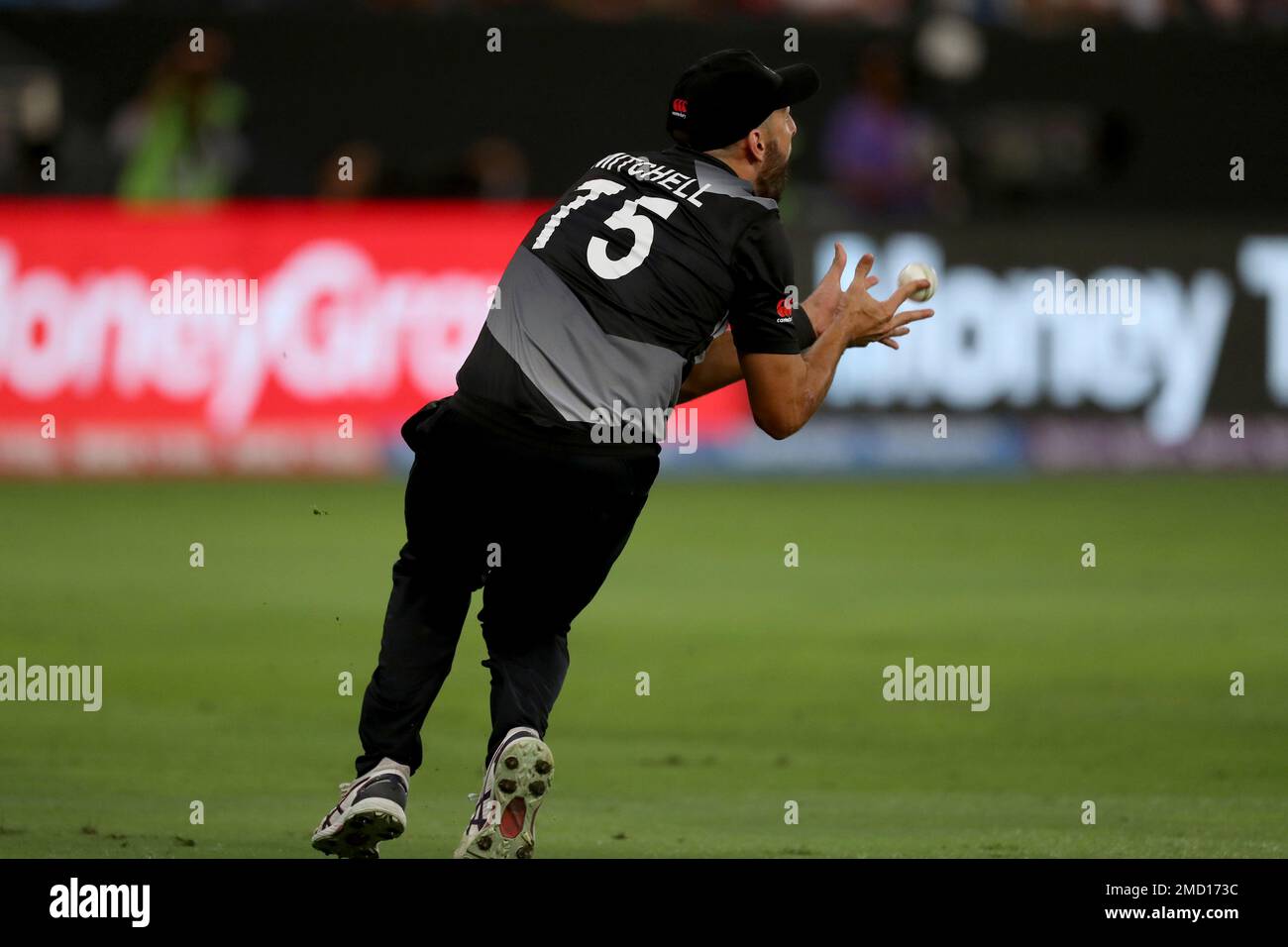 New Zealand's Daryl Mitchell catches out Australia's captain Aaron ...