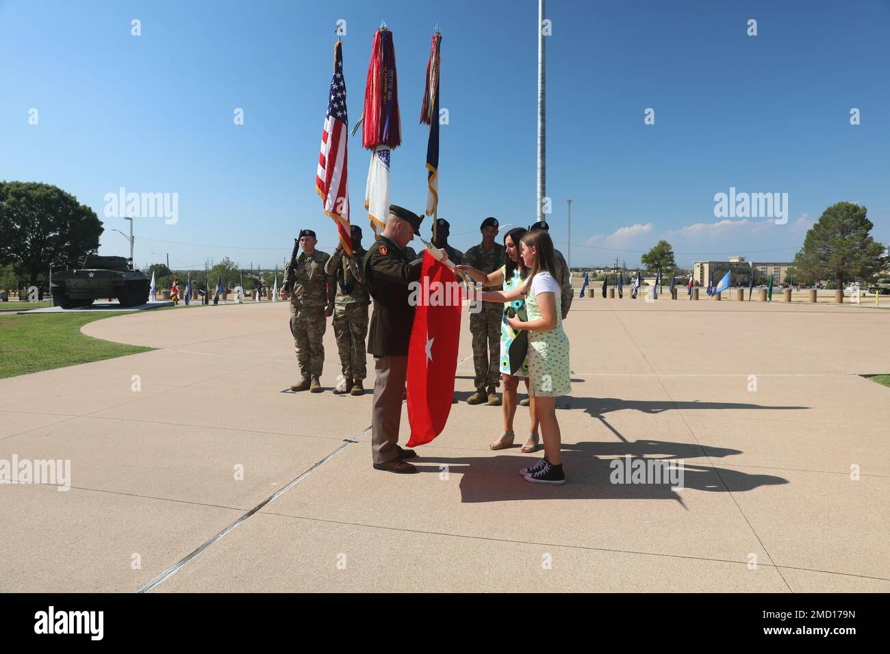 U.S. Army Brig. Gen. Matthew W. Brown, is assisted by his wife Heike ...