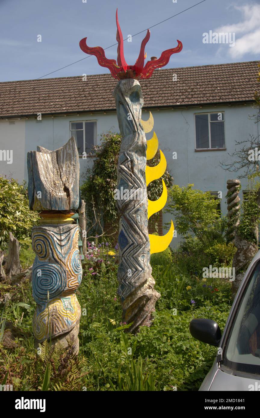 DIY totem poles in garden in Chaffcombe, Somerset Stock Photo - Alamy